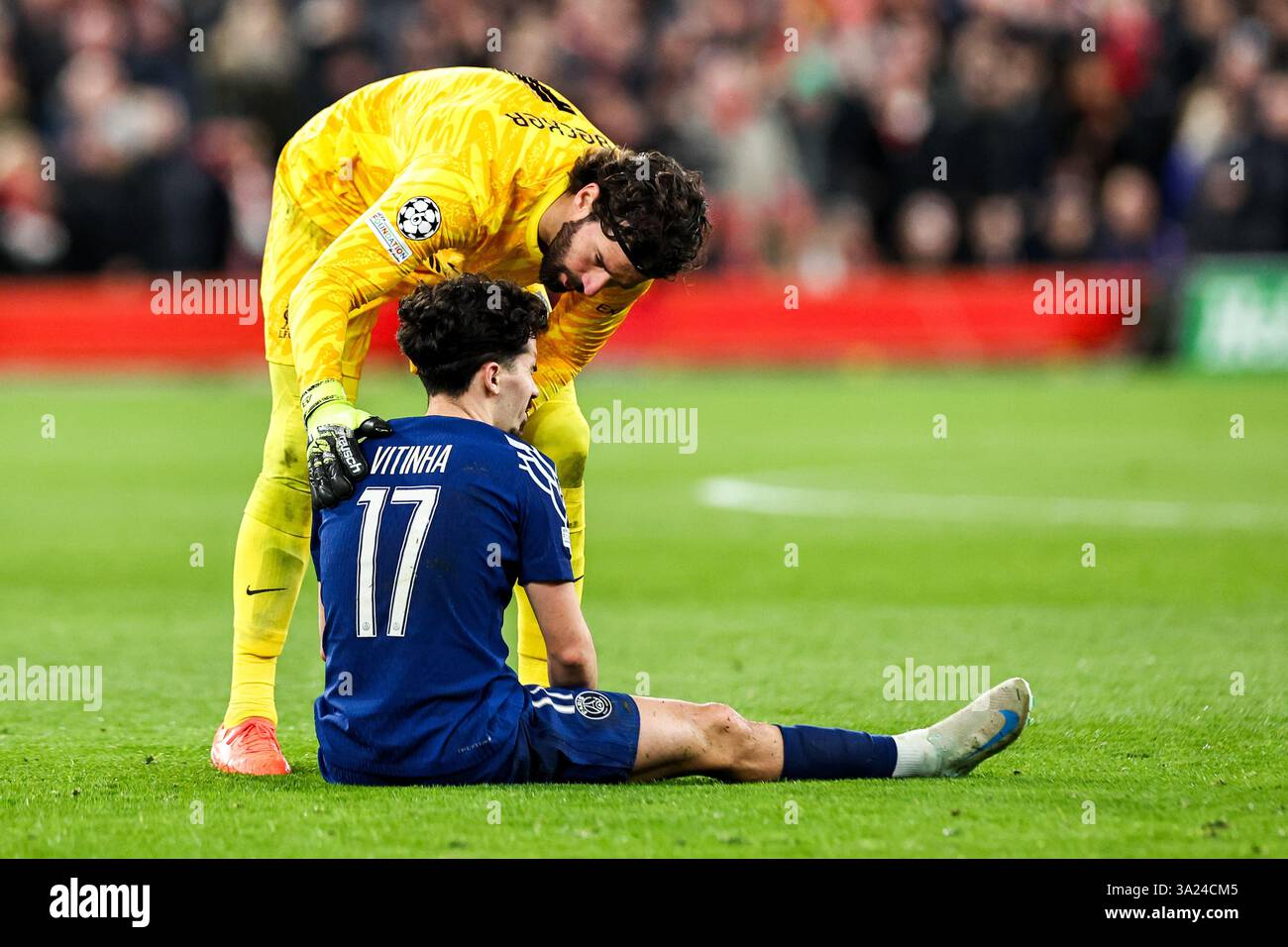 Liverpool, UK. 11th Mar, 2025. Alisson Becker of Liverpool speaks to ...