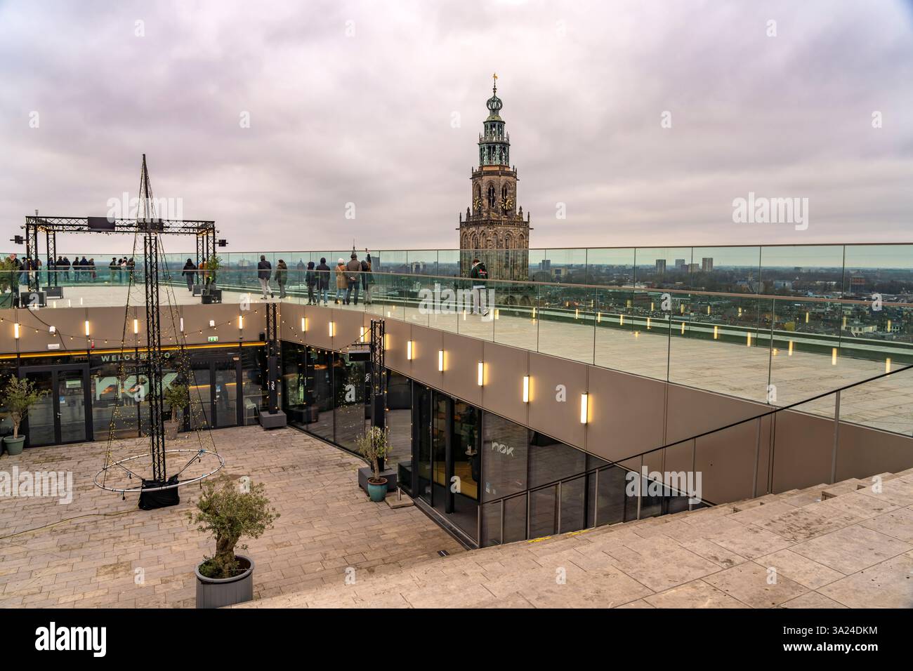 Roof terrace of the Forum Groningen and the church tower Martinitoren ...