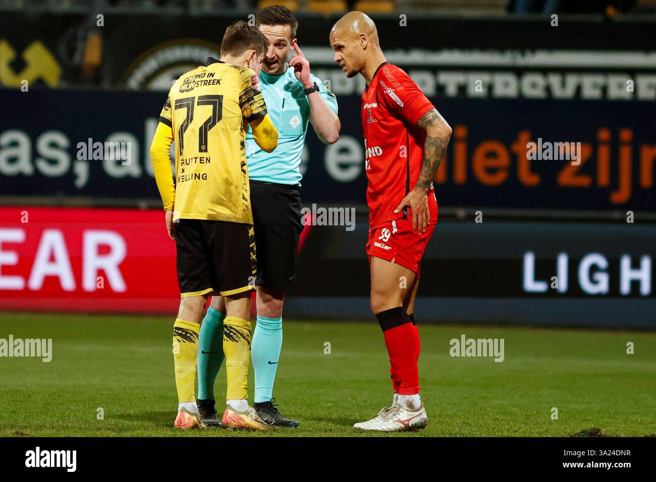 KERKRADE , NETHERLANDS - MARCH 11: Referee Luc Timmer talks with Patriot Sejdiu of Roda JC and ...