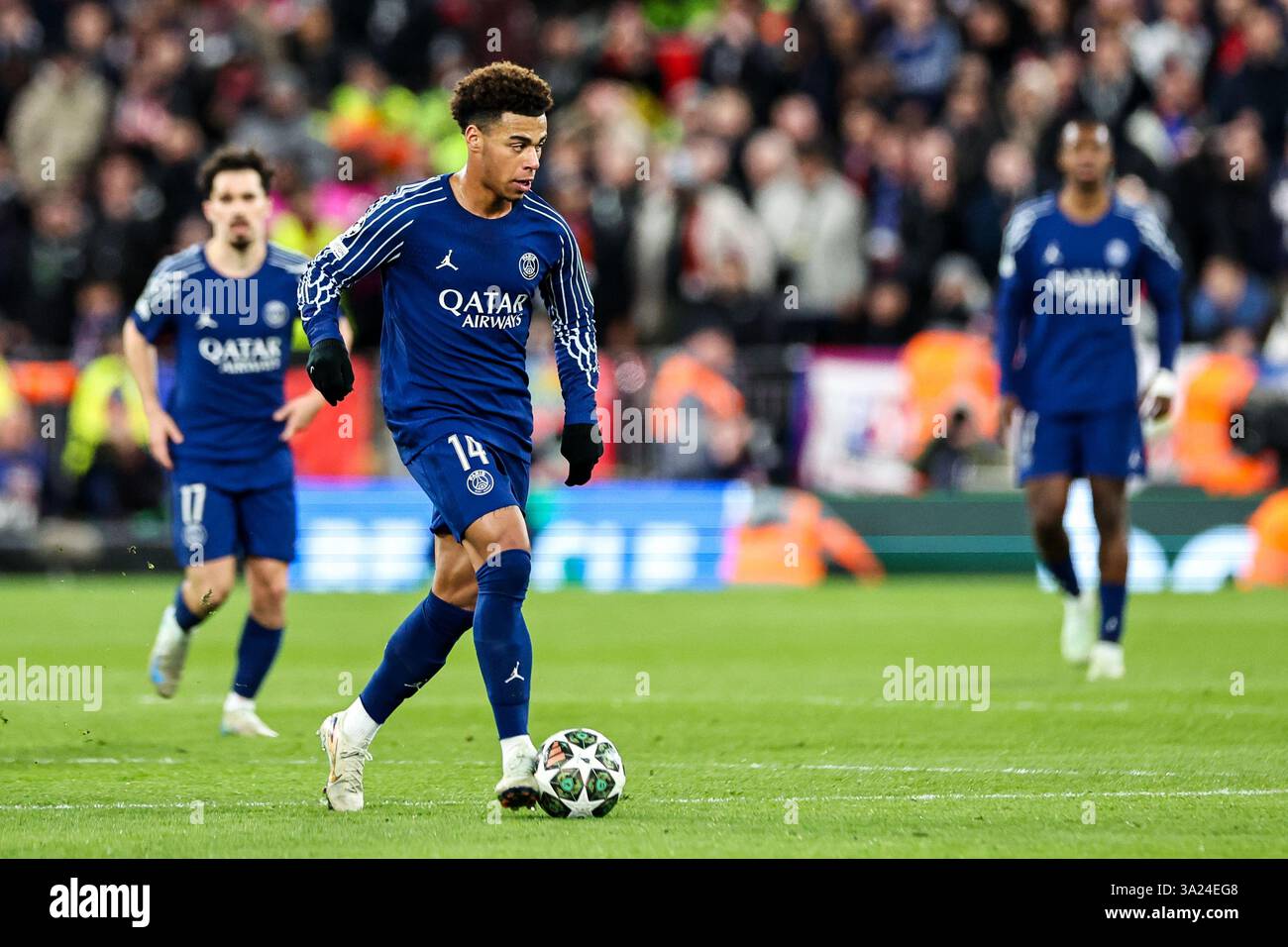 Liverpool, UK. 11th Mar, 2025. Desire Doue of Paris Saint-Germain runs ...