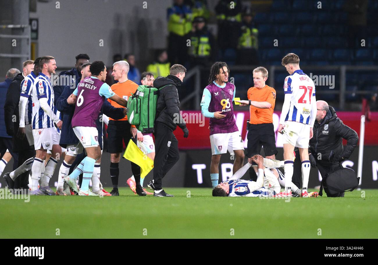 Referee Gavin Ward after showing a red card to Burnley's CJ Egan-Riley ...