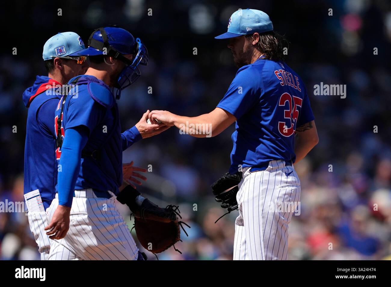 Chicago Cubs pitcher Justin Steele, right, is pulled from the game ...