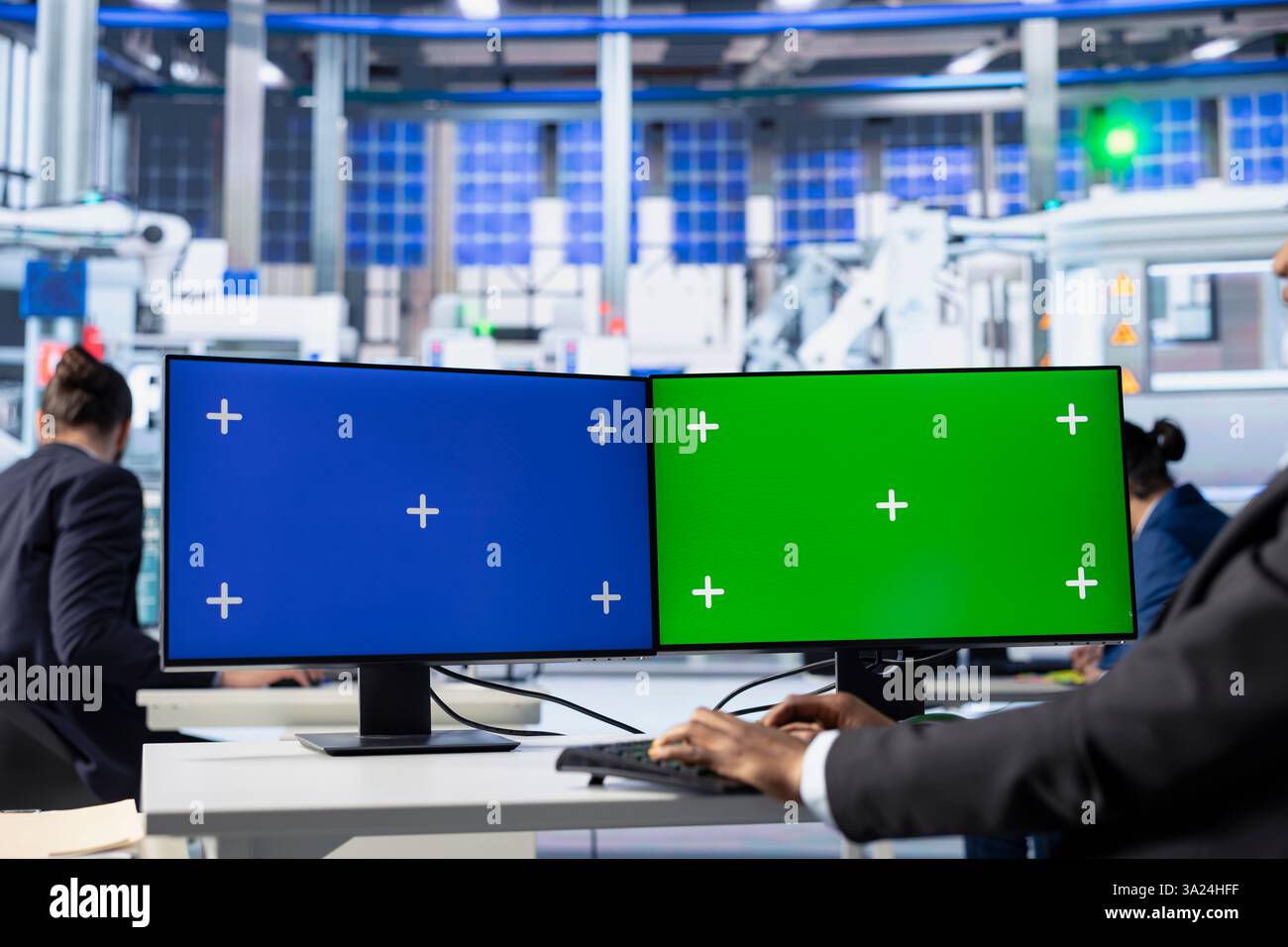 Solar panels plant engineer overseeing energy consumption using ...