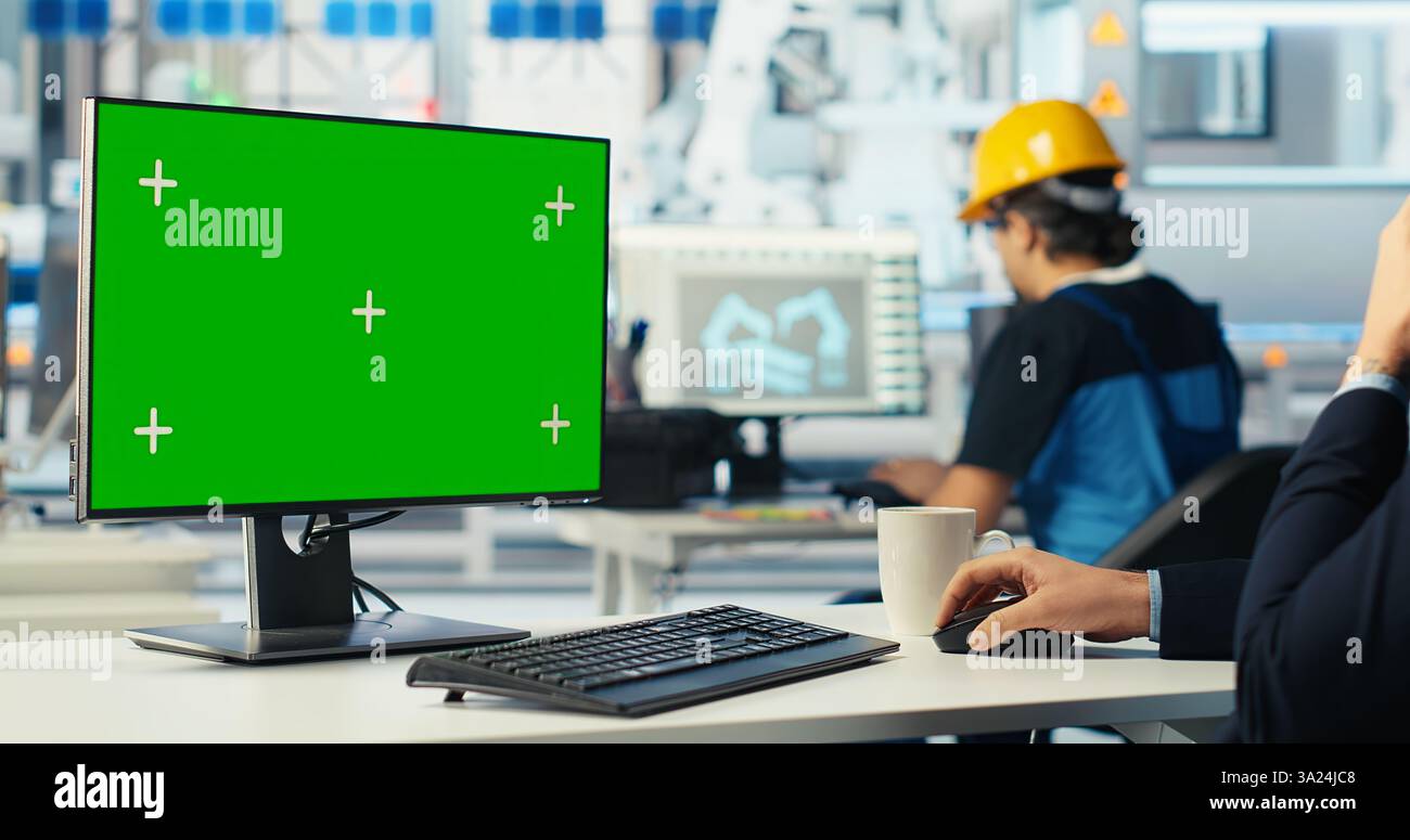 Photovoltaics factory worker analyzing data on green screen PC, reviewing system metrics. Solar ...