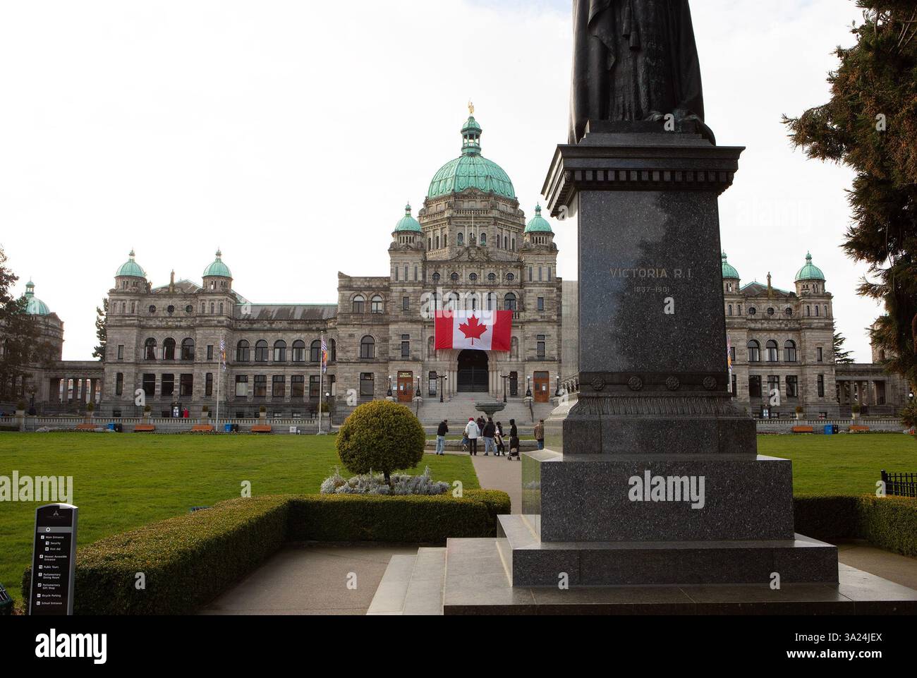 Victoria, Can. 07th Mar, 2025. A large Canadian flag hangs over the ...