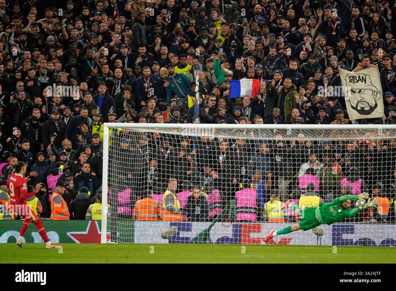 PSG's goalkeeper Gianluigi Donnarumma saves a penalty from Liverpool's ...