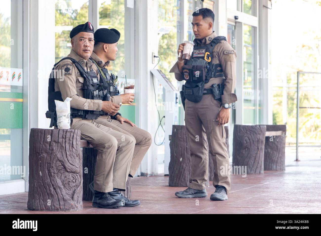 YALA, THAILAND, MAR 02 2024, A team of police officers have a snack in ...