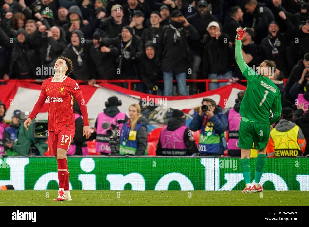 PSG's goalkeeper Gianluigi Donnarumma reacts after saving a penalty ...