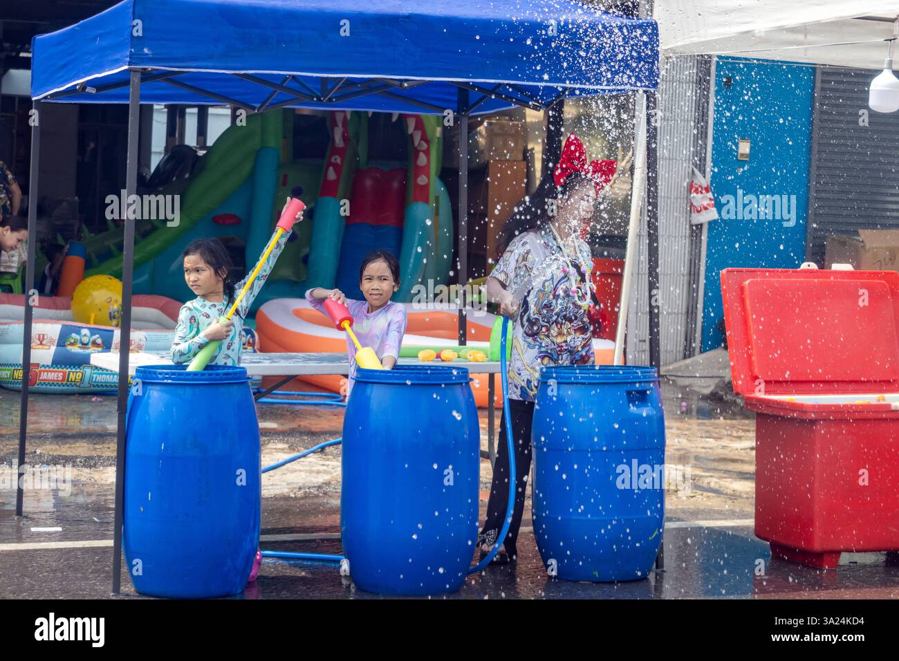 BANGKOK, THAILAND, APR 13 2024, People spraying water to celebrate the ...