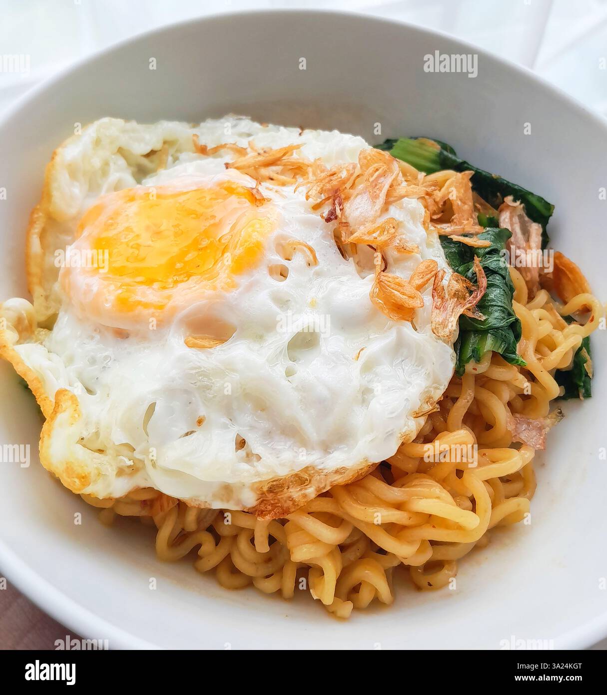 Instant fried noodles or Indomie Goreng, Indonesian food Stock Photo ...