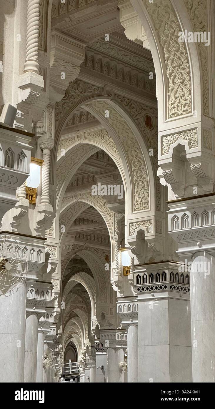A Muslim pilgrim praying inside the grand Masjid al-Haram in Mecca ...
