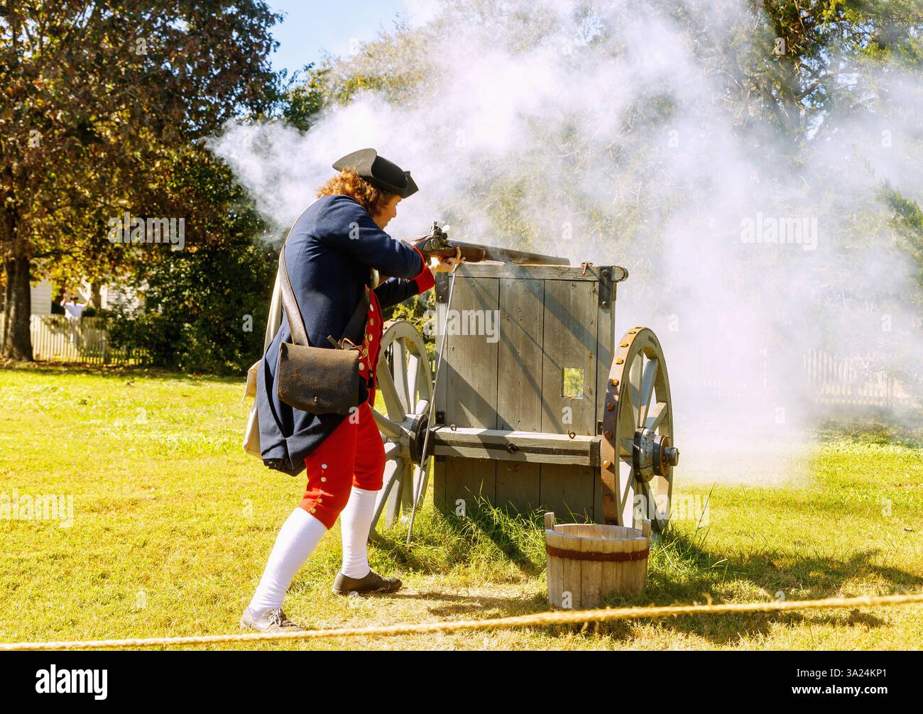Firing the Noon Gun at the Colonial Willliamsburg Living History Museum ...