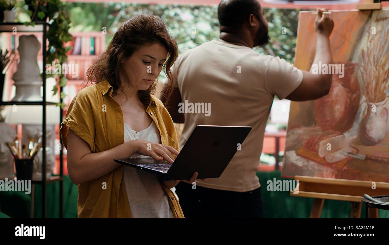 Team of painters collaborating on a new rustic masterpiece in art and ...