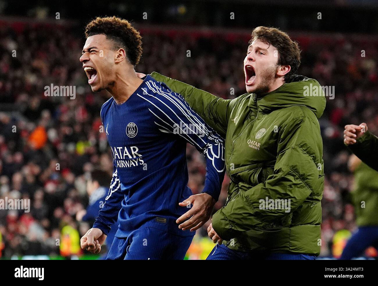 Paris Saint-Germain's Desire Doue (left) celebrates scoring the winning ...