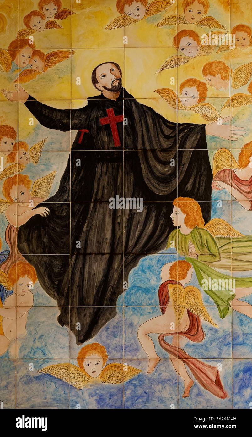 Naples, ITALY - 10-24-2024: Mural painting on tiles of Saint Camillus ...