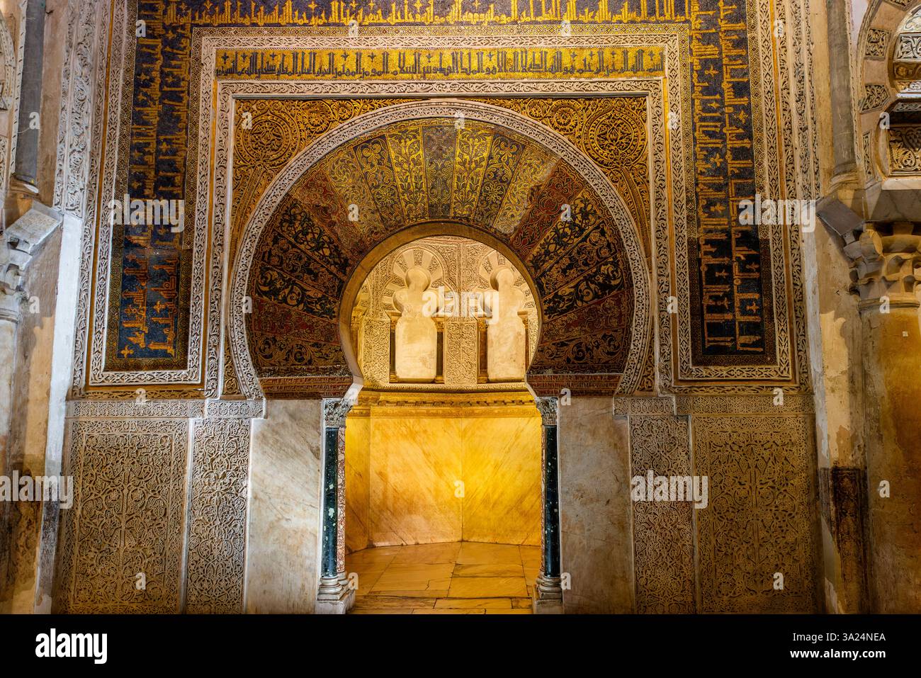famous horseshoe arched mihrab or prayer niche inside the mosque ...
