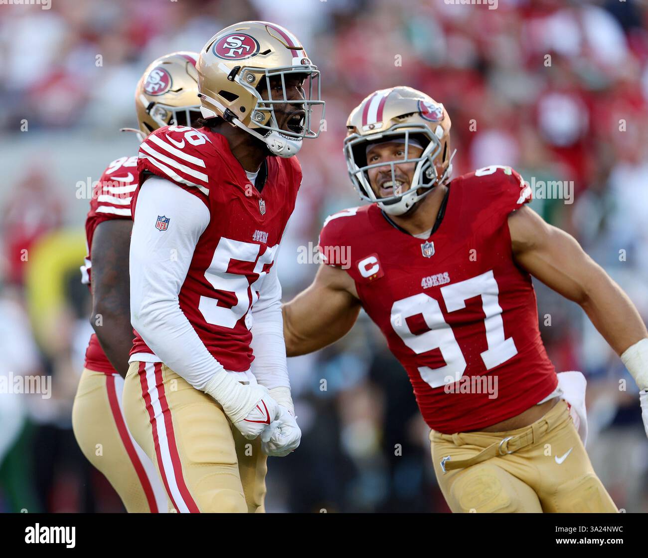 The San Francisco 49ers' Leonard Floyd (56) and Nick Bosa (97 ...