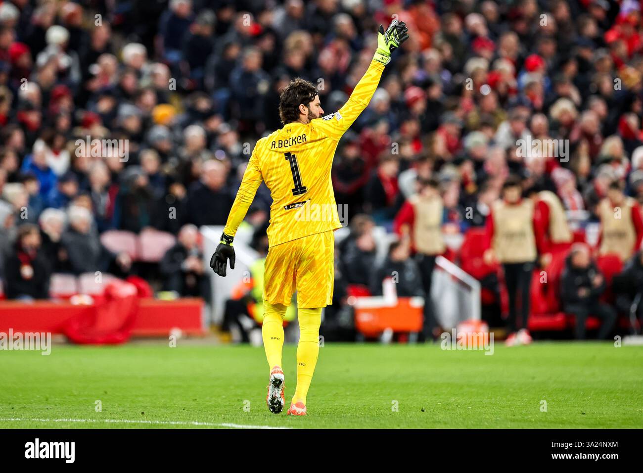 Liverpool, UK. 11th Mar, 2025. Alisson Becker of Liverpool gives the ...