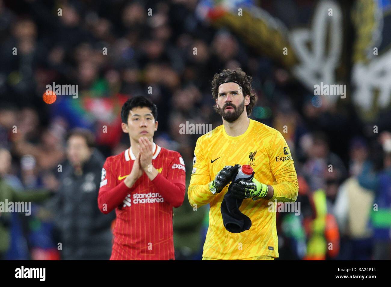 LIVERPOOL, UK - 11th Mar 2025: Alisson Becker of Liverpool applauds the ...