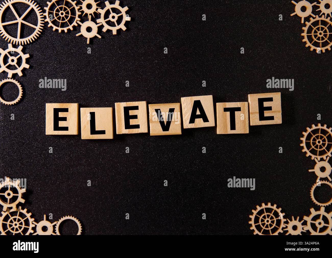 wooden blocks displaying the word 'ELEVATE' signify a concept of ...