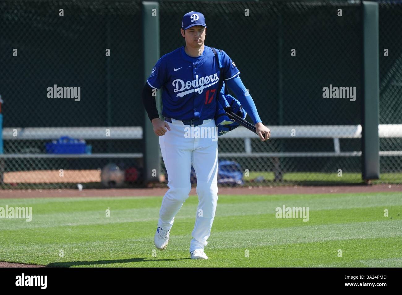 Los Angeles Dodgers' Shohei Ohtani, of Japan, runs on the field prior ...