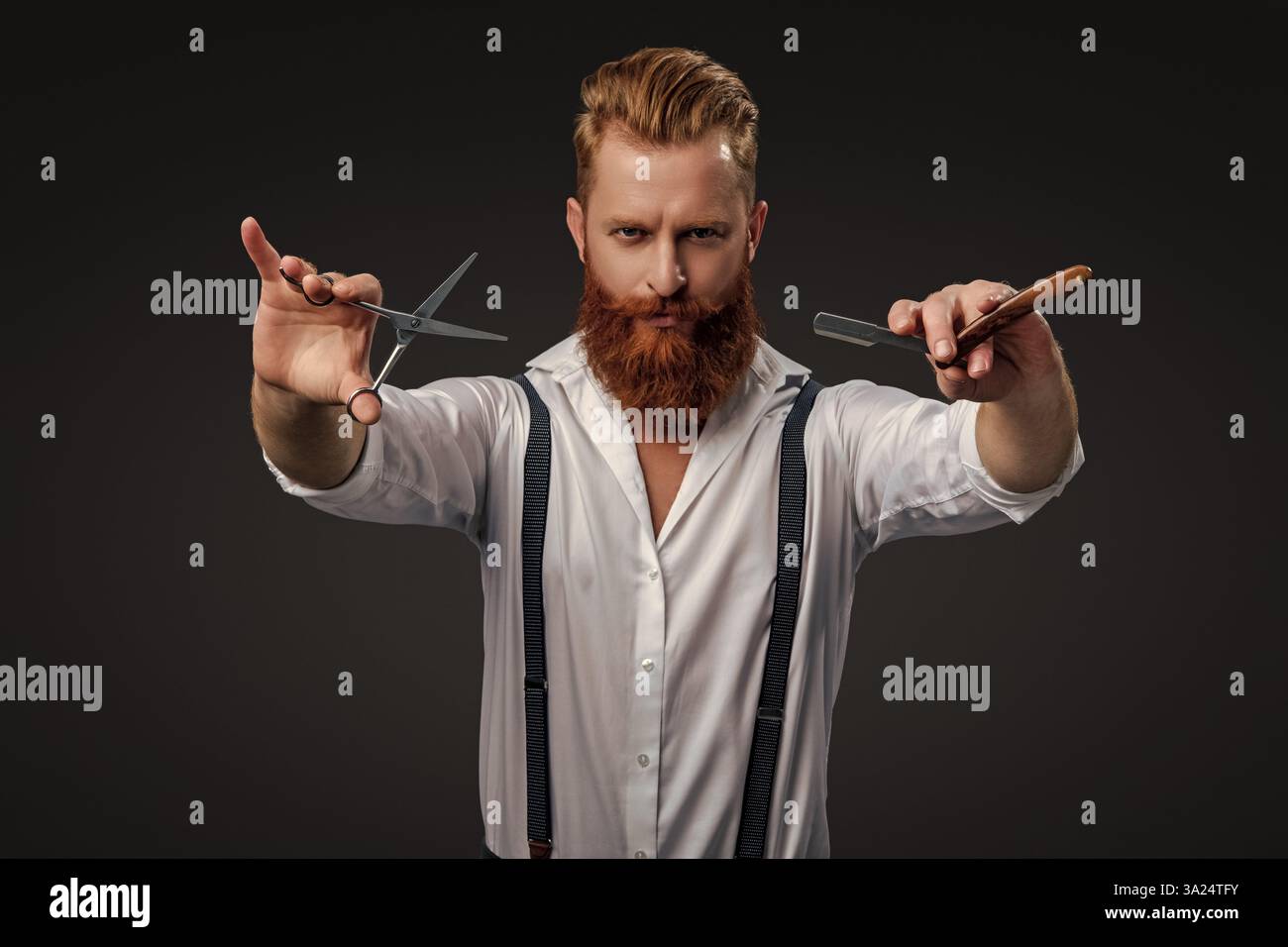 Man barber with razor blade do haircut. Man barber making a haircut in ...