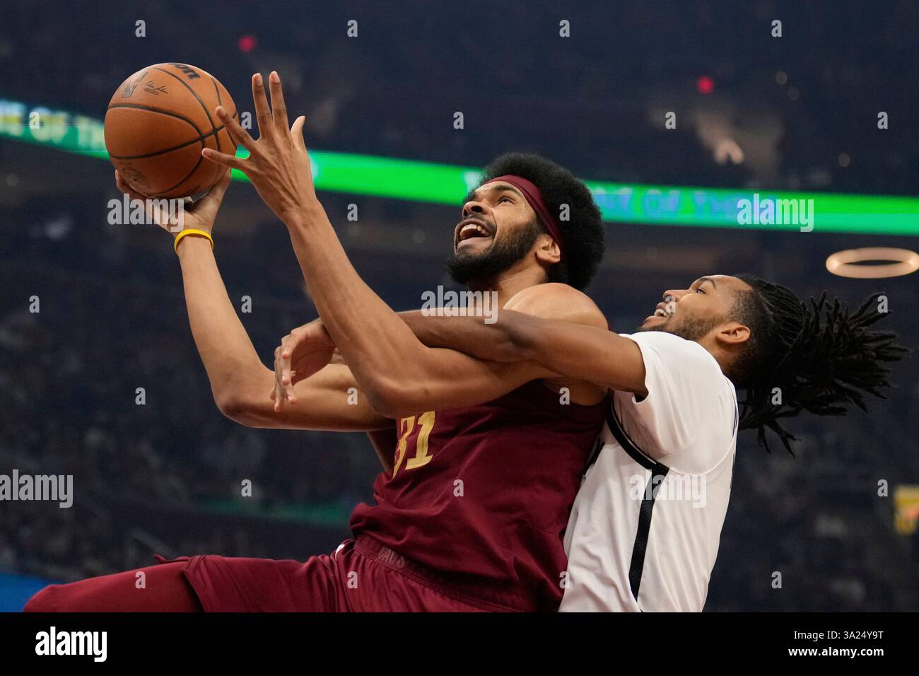 Cleveland Cavaliers center Jarrett Allen (31) is fouled by Brooklyn Nets forward Ziaire Williams ...