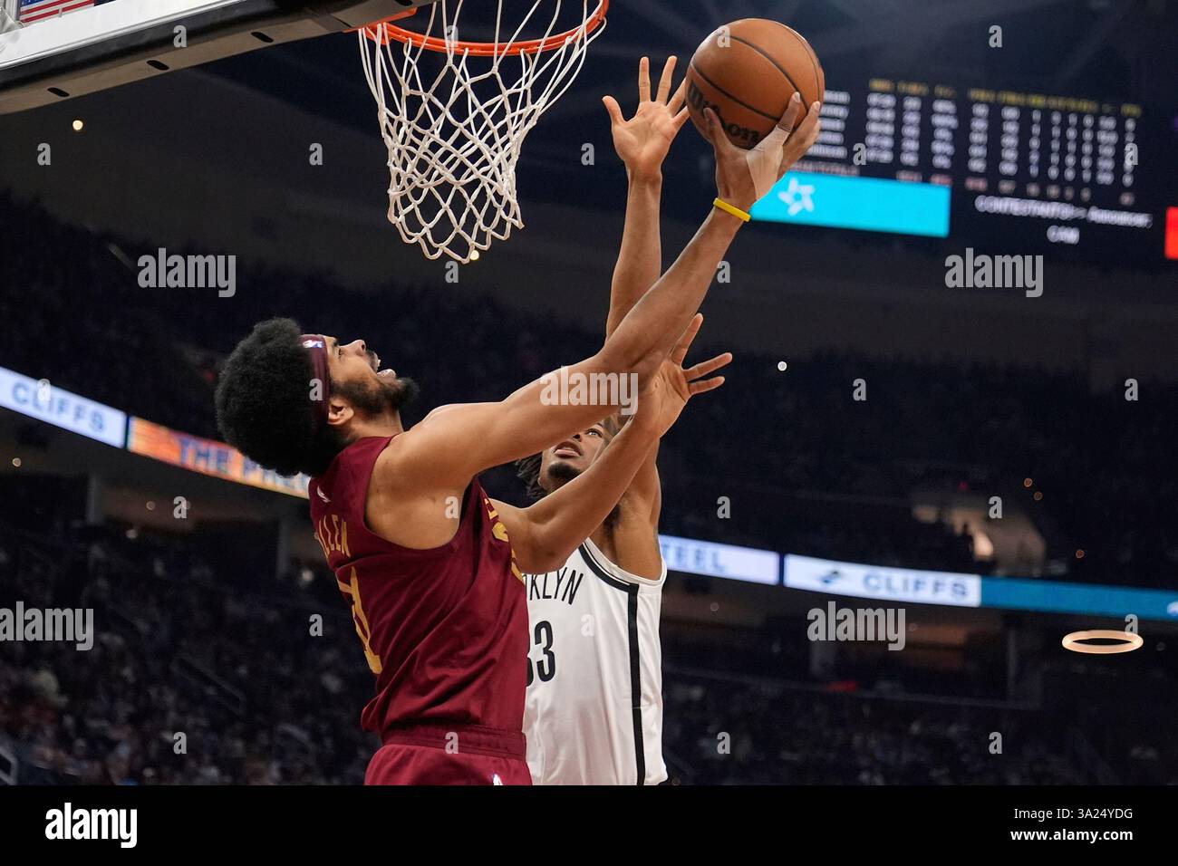 Cleveland Cavaliers center Jarrett Allen (31) shoots in front of Brooklyn Nets center Nic ...