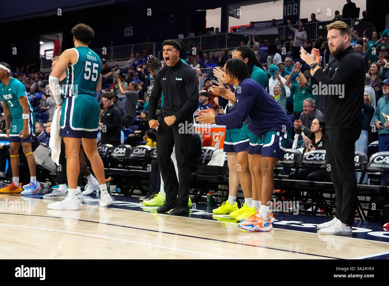 WASHINGTON, DC - MARCH 11: The UNCW Seahawks bench reacts to a play on ...