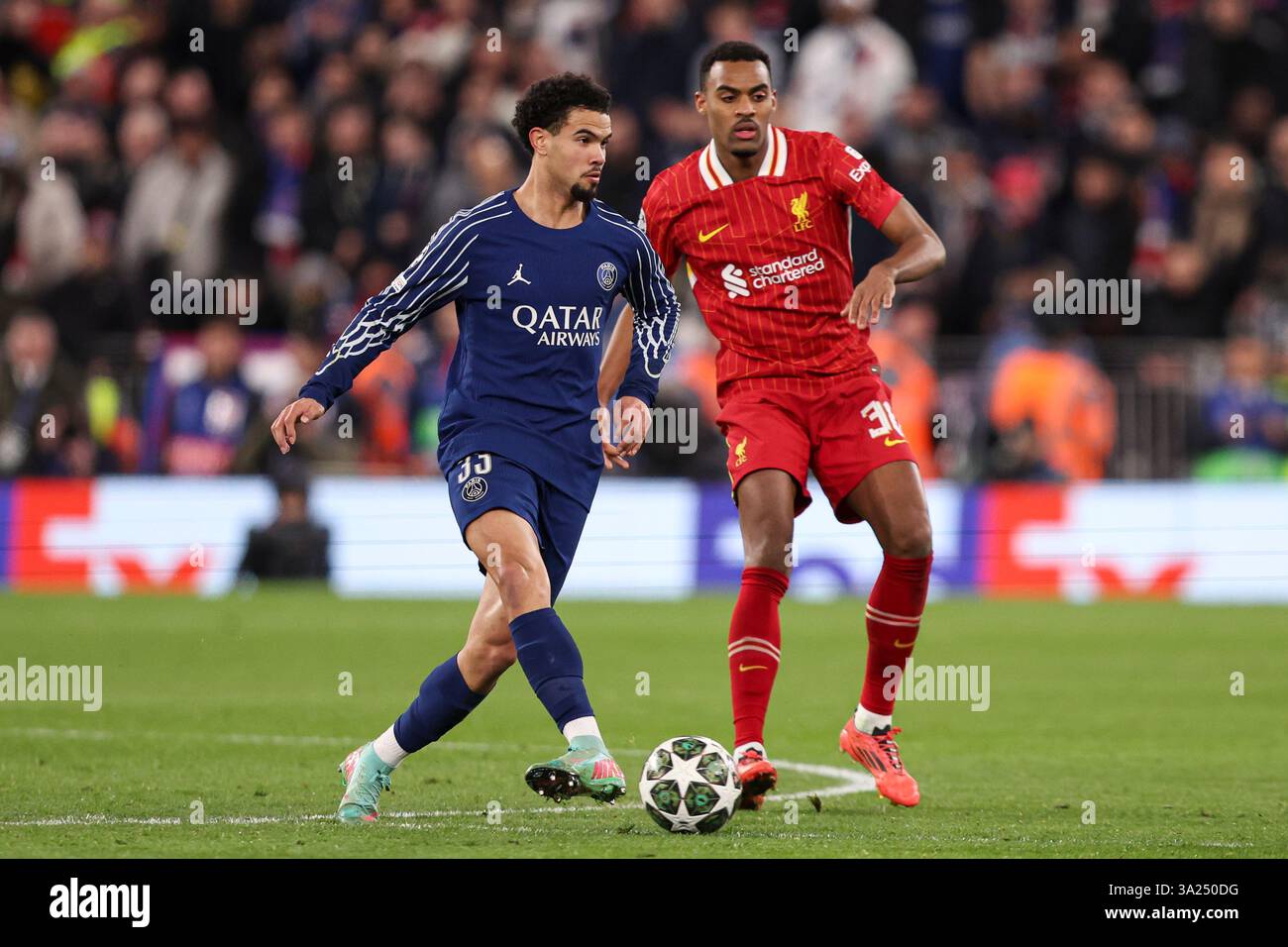 Liverpool, UK. 11th Mar, 2025. Warren Zaïre-Emery of PSG (L) under ...