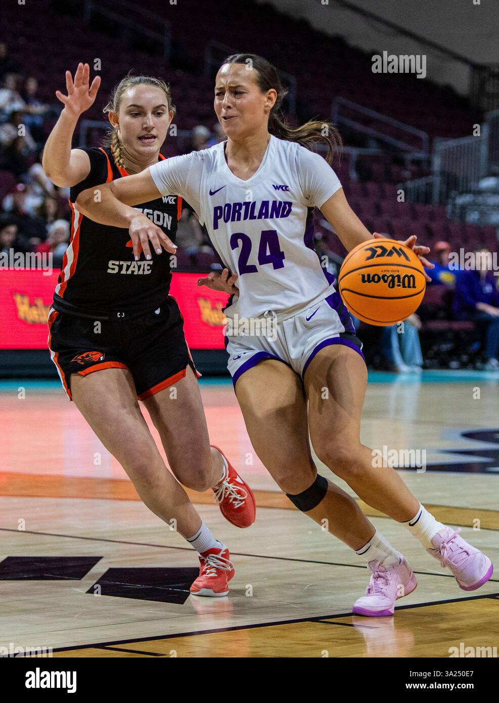 Portland guard Maisie Burnham (24) and Gonzaga forward Eliza Portland guard Maisie Burnham (24) and Gonzaga forward Eliza