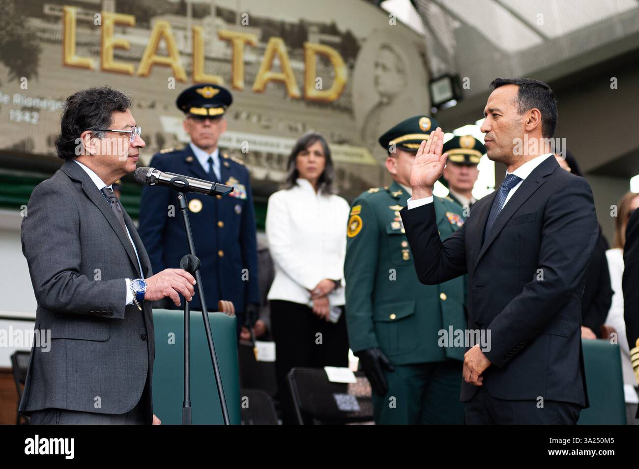 Colombian president Gustavo Petro (L) swears in retired general Pedro ...