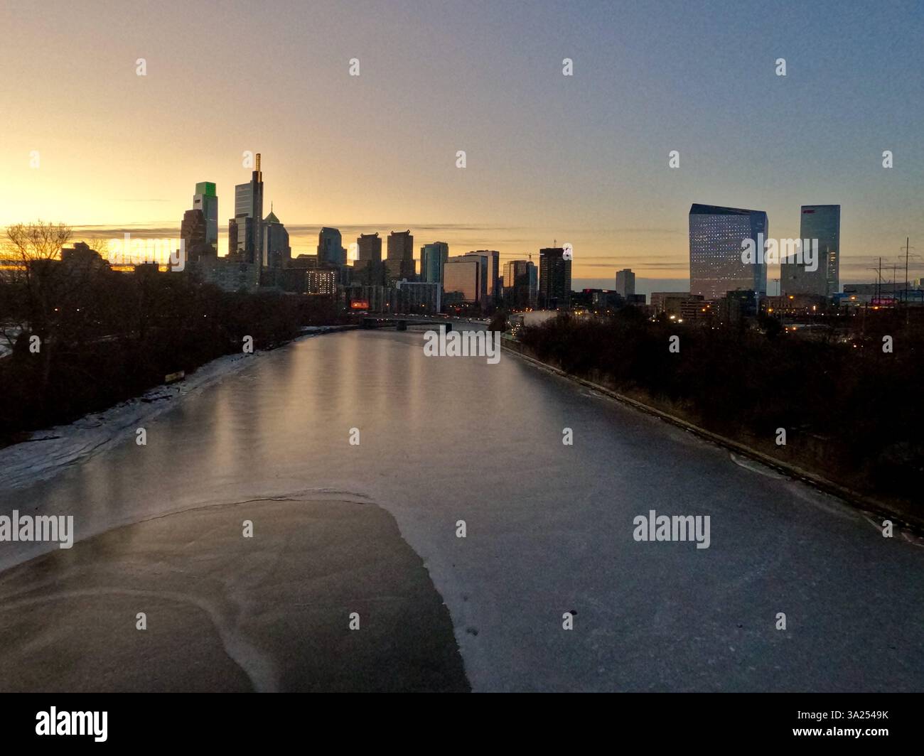 The sun rises above the Philadelphia skyline and the frozen-solid ...