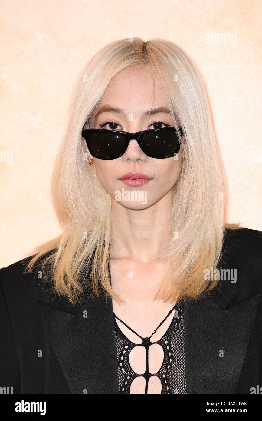 Kitty Chicha Amatayakul attending the Yves Saint Laurent Womenswear ...
