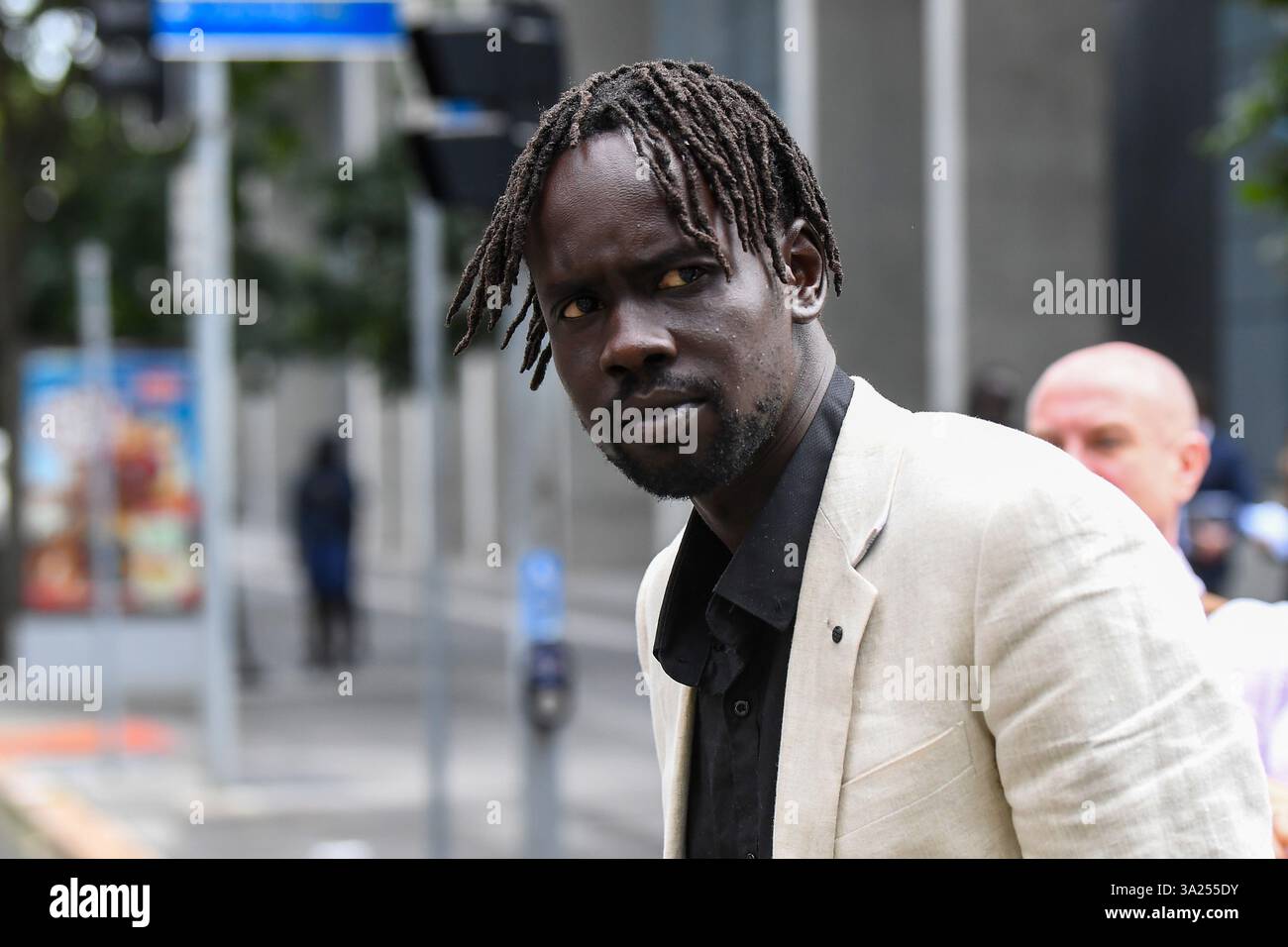 Malat Akoi Makuach leaves the Brisbane Supreme Court in Brisbane ...