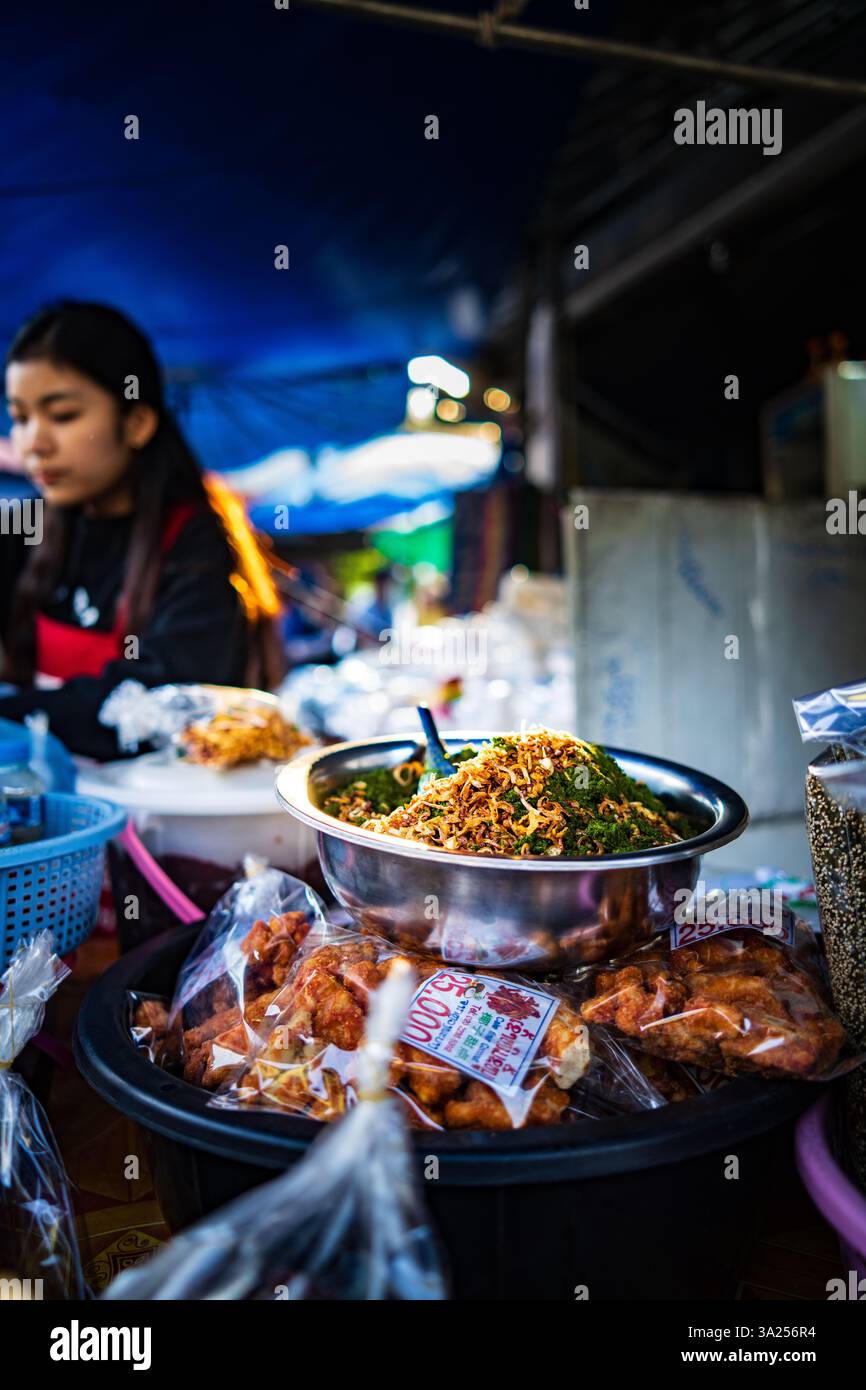 A colorful array of snacks at a market in Luang Prabang, Laos. This ...