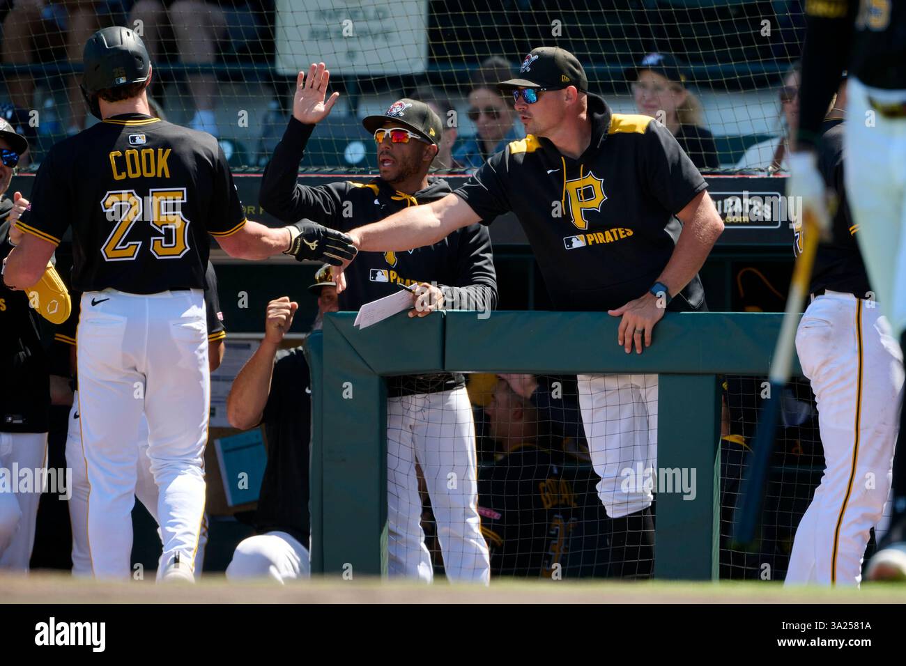 Pittsburgh Pirates coaches Don Kelly (right) and Jonny Tucker (center ...