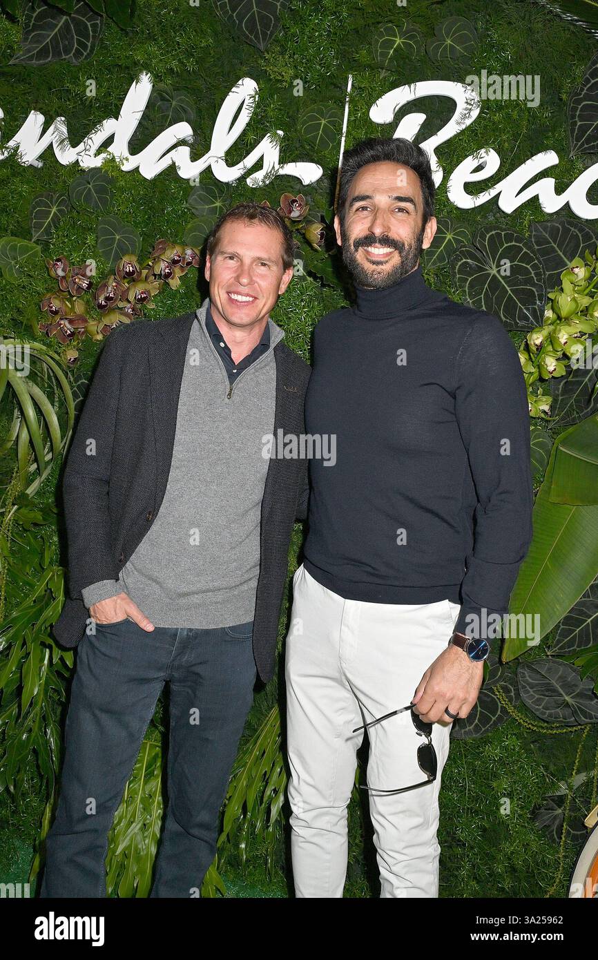 Adam Stewart, Executive Chirman, Sandals Resort and Amir Arison attend ...