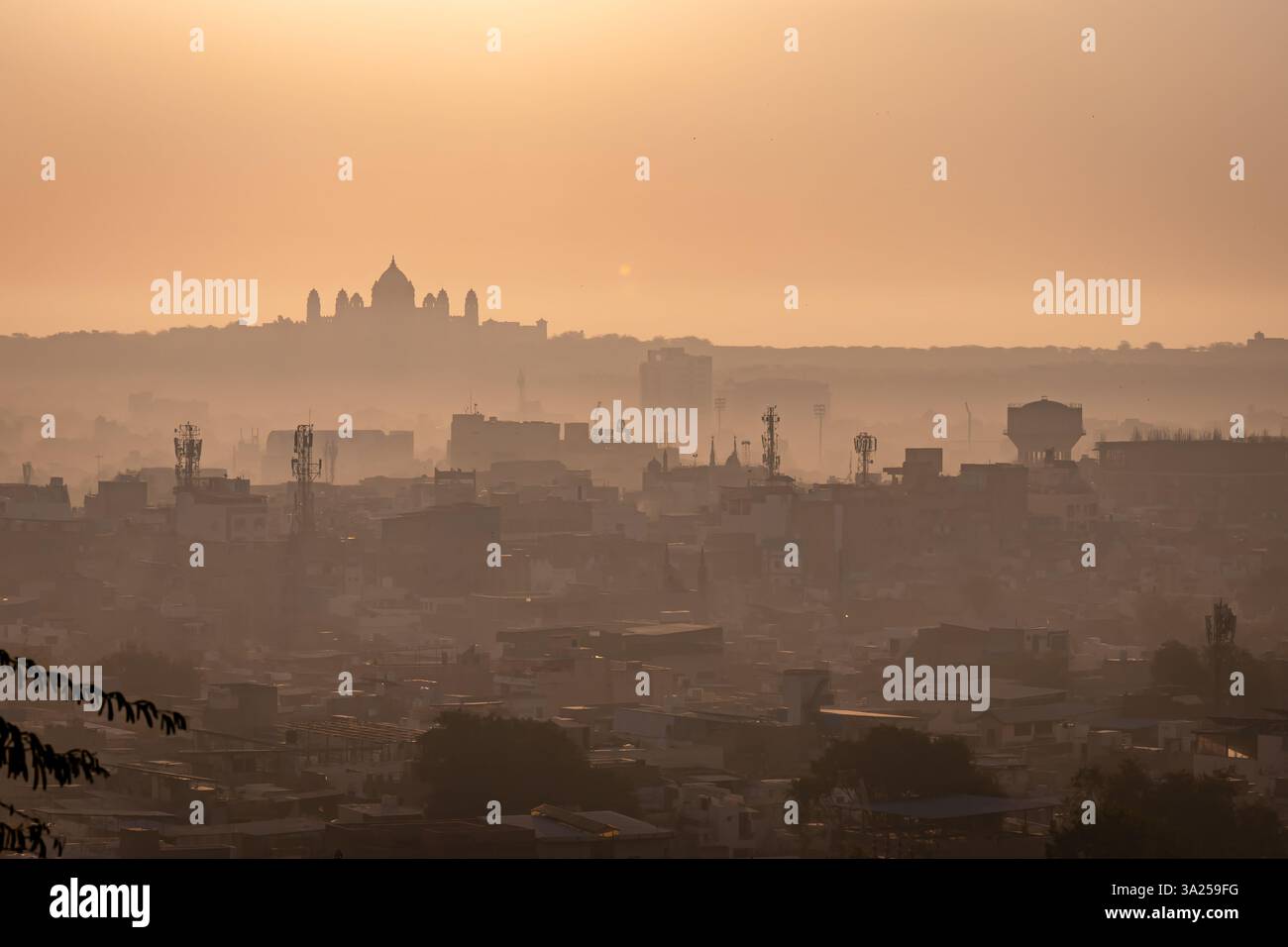 Crowded Cityscape with Palace and Sunrise Mist Stock Photo - Alamy
