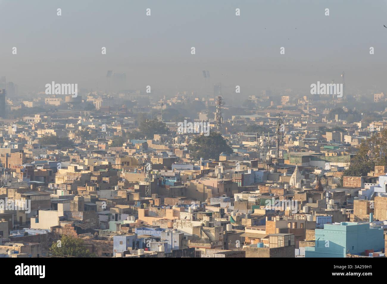 crowded misty city view from mountain top at morning image is taken at ...