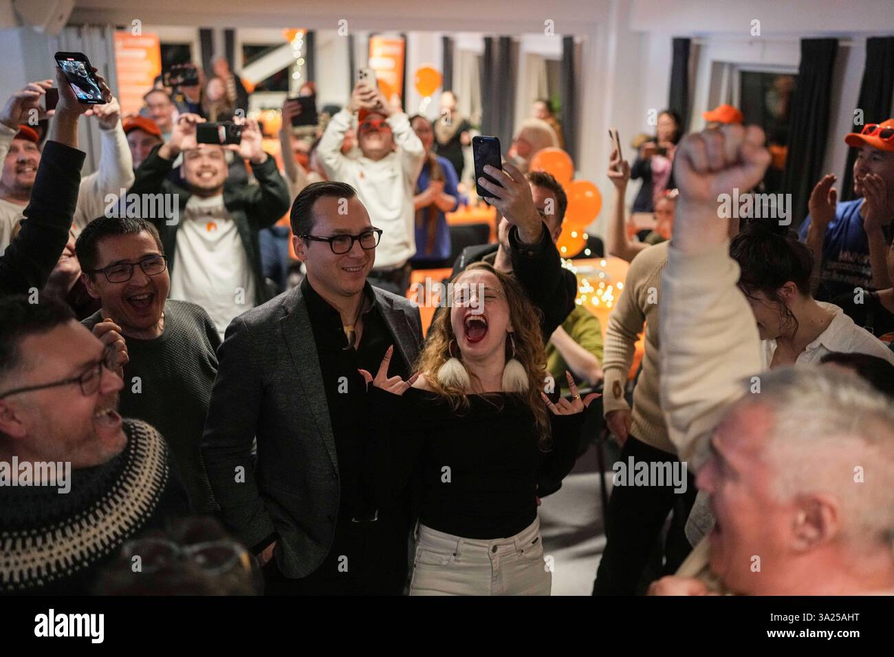 Candidate Aki-Matilda Høegh-Dam, of the Naleraq party, center, dances ...