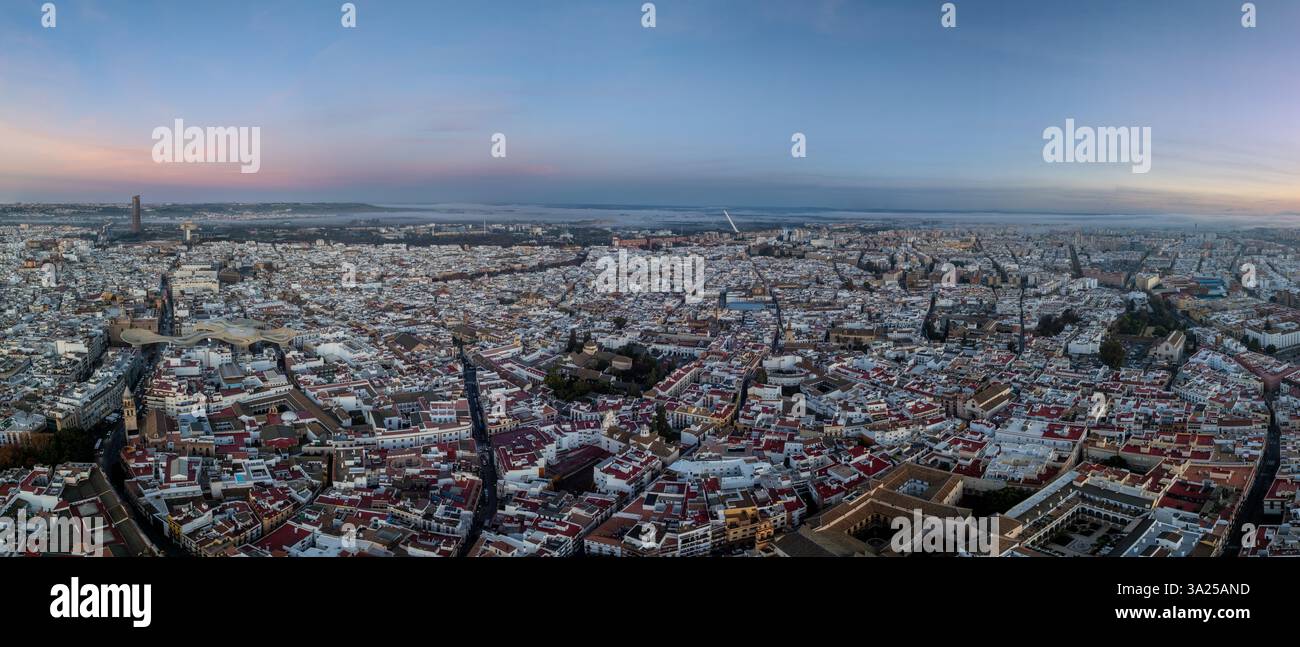 Aerial view of Seville historic town center Casco antiguo with churches ...