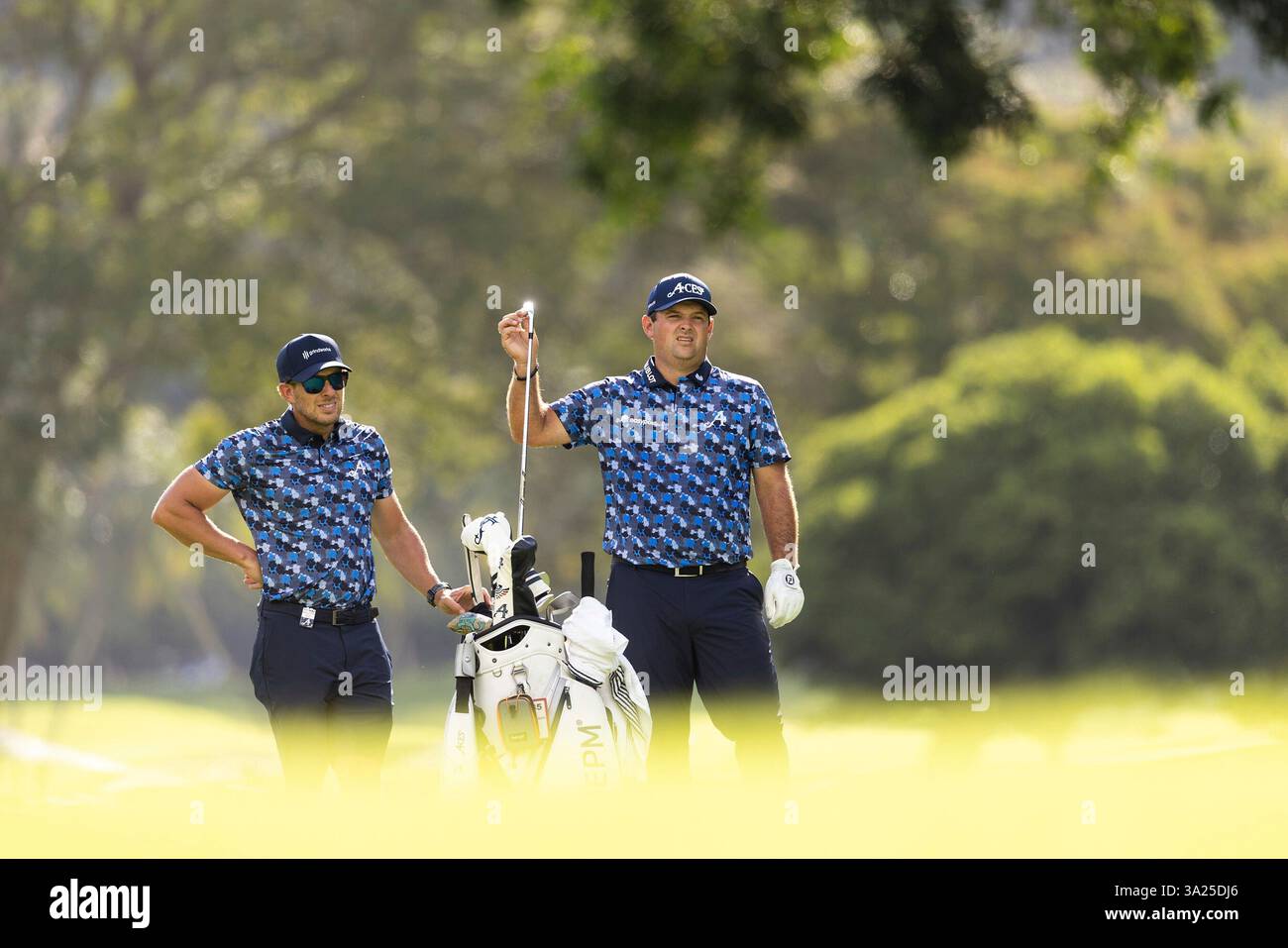 Patrick Reed of 4Aces GC and caddie, Kessler Karain, seen on the 11th ...