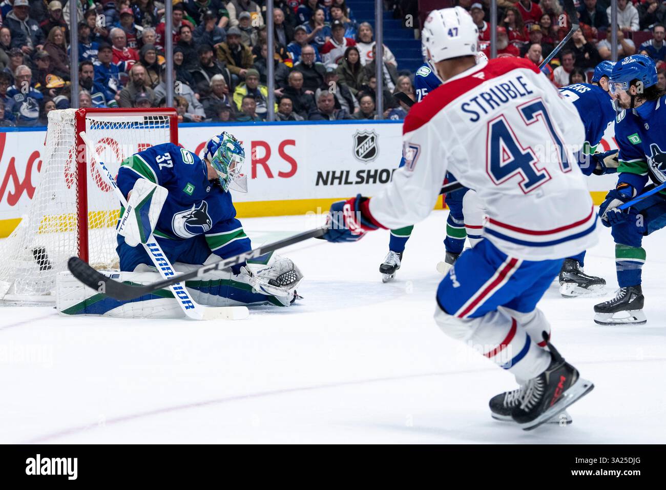Vancouver Canucks goaltender Kevin Lankinen (32) stops Montreal ...