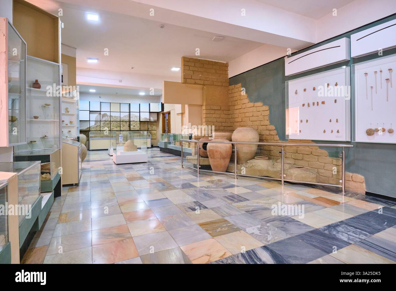 A display of old clay, pottery vases, pieces. At the Afrasiyab Museum ...