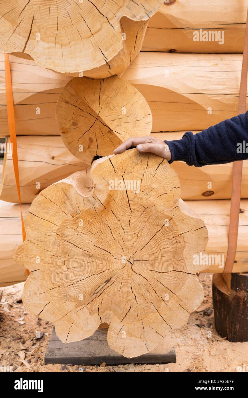 The construction site of a wooden house. Traditional log cabin built ...