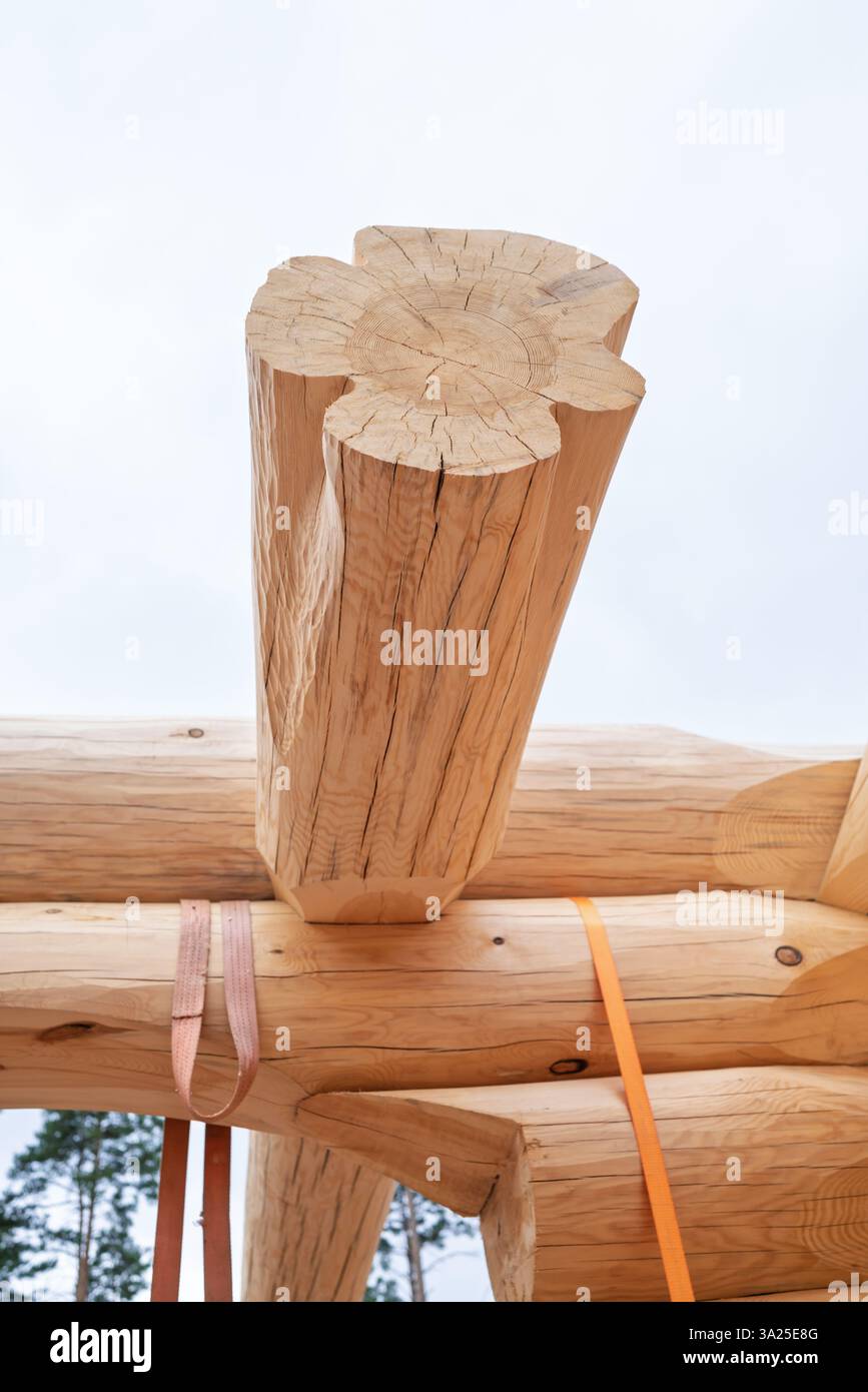 The construction site of a wooden house. Traditional log cabin built ...