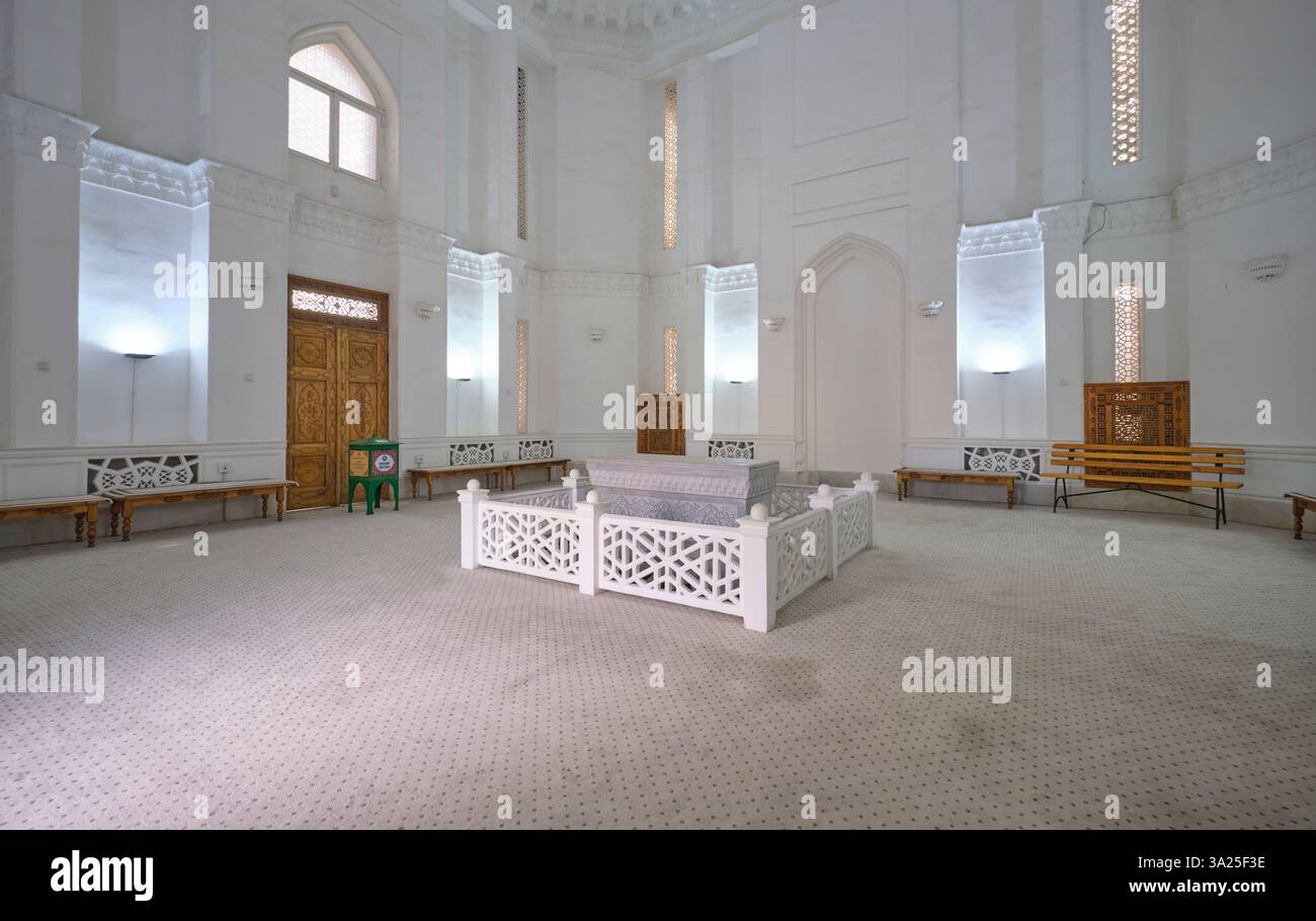 Interior view of the simple, white domed style and grave. At the Abu ...