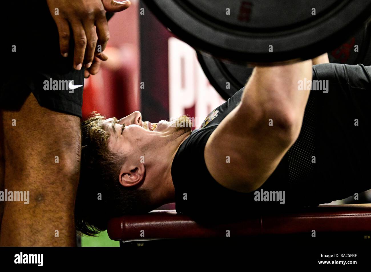 Oklahoma defensive lineman Caiden Woullard (90) attempts bench press ...