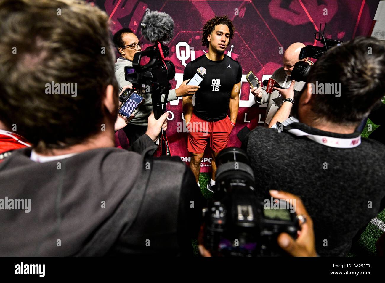 Oklahoma quarterback Casey Thompson (16) gives an interview during Oklahoma's NFL pro day ...